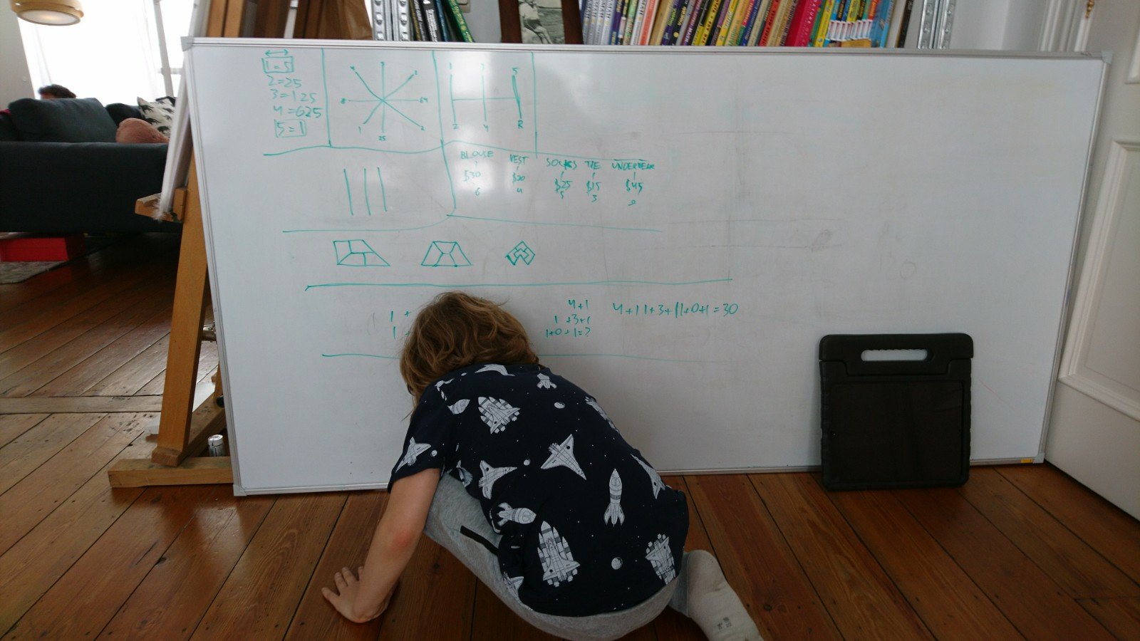 Simon entertaining guests with math riddles – Geeks out of the box